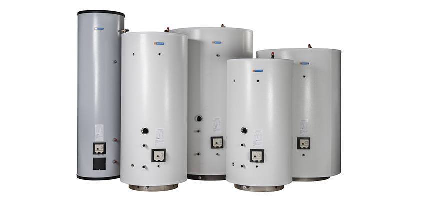 What is the purpose of a calorifier tank in hot water systems?